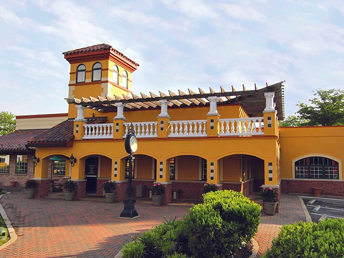 Pizza John's sunshine-yellow Spanish architecture stands out like a delicious mirage in Essex.