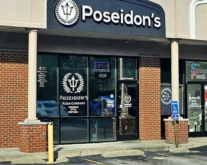 That bright sign promises Mediterranean magic, and trust me, Poseidon delivers on every slice.