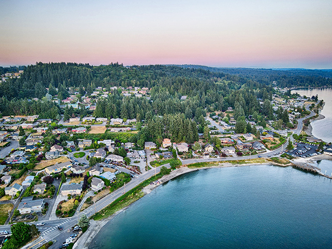 Aerial perfection reveals Poulsbo's Norwegian charm nestled along Liberty Bay's sparkling waters like a Scandinavian postcard.