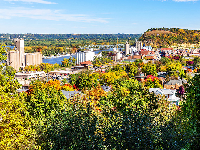 River town elegance spreads along the Mississippi like a well-planned dinner party for thousands.