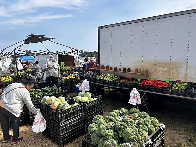 Farm-fresh bonanza! Reits Market's produce section showcases Michigan's agricultural bounty in all its colorful glory.