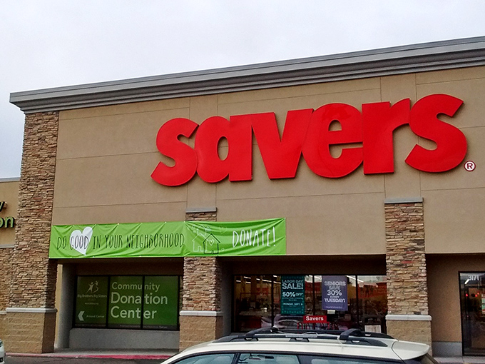 Savers' unmistakable red logo – as bold as the bargains waiting inside this thrifter's paradise.