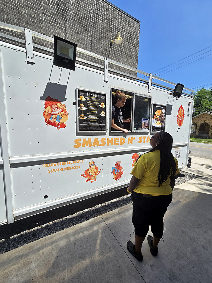 Smashed N' Stacked's food truck brings burger innovation on wheels. Those cartoon characters know they're guarding serious flavor!