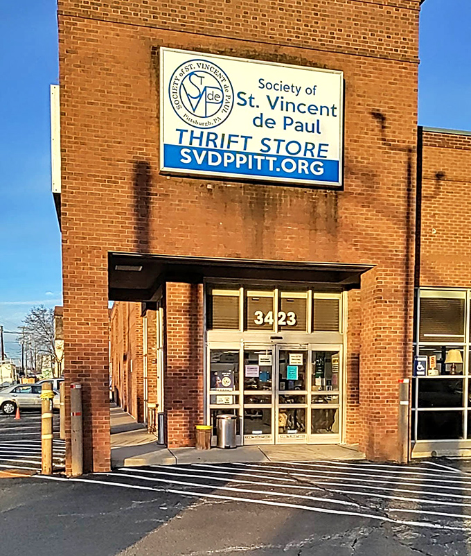 St. Vincent de Paul's classic brick building has that timeless, trustworthy appeal. The simple sign announces their mission without any fancy frills.