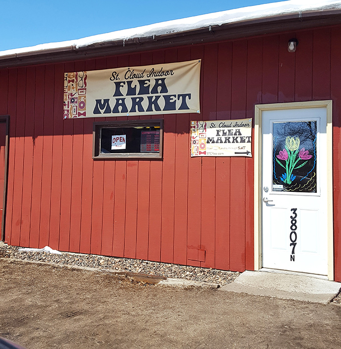 That cheerful red exterior welcomes treasure hunters like an old friend who always has the best stuff in their garage.
