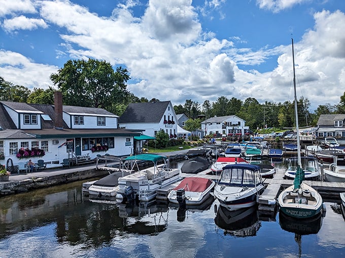 Sunapee Harbor's boats rest peacefully at their moorings, a floating neighborhood where each vessel tells its own story of lake adventures.
