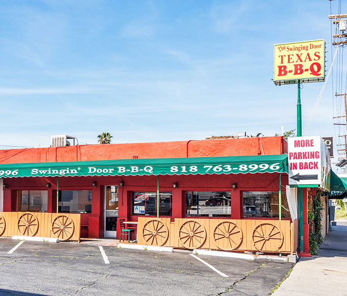 Swinging Door's bright red exterior and wagon wheel decor brings Texas to North Hollywood. Like a roadside BBQ joint that took a wrong turn at Albuquerque.
