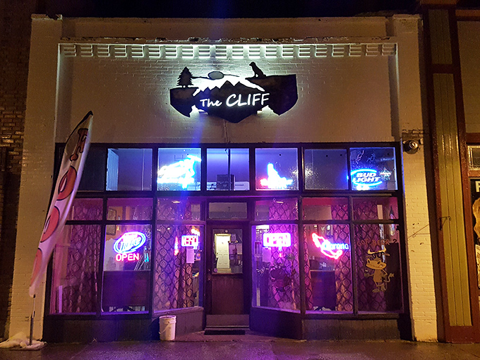 The Cliff's neon glow transforms this small-town storefront into a midnight seafood oasis worth the detour.