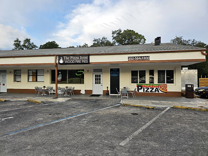 Roadside revelation! This humble building houses wood-fired wonders that would make pizza purists weep with joy. Sometimes greatness comes in plain packages.
