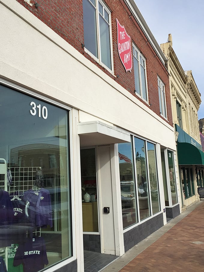 The iconic red shield marks the spot where treasure hunting meets community support. X marks the spot!