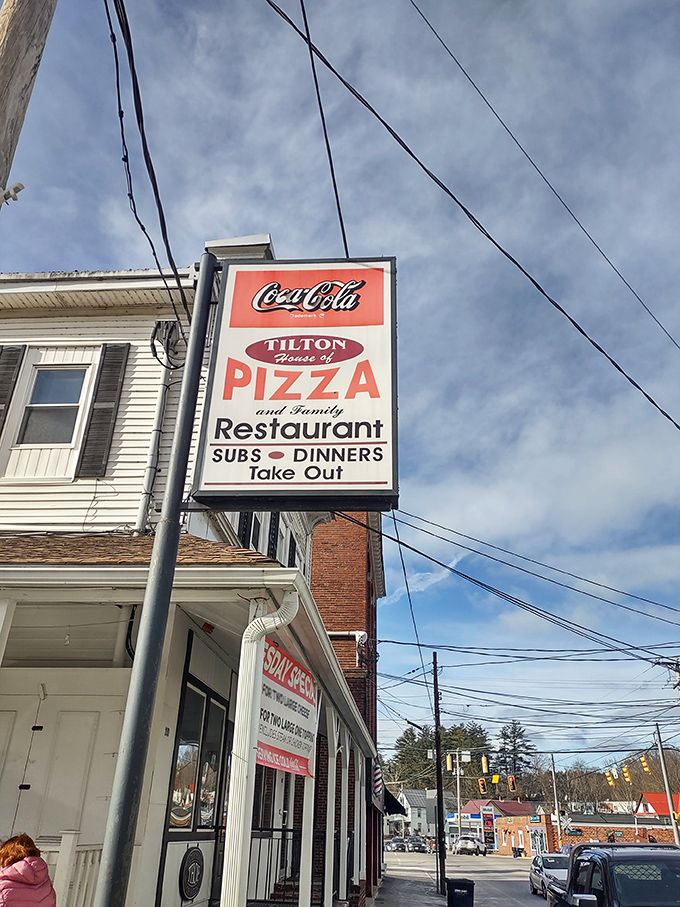 This old-school Coca-Cola sign takes you back to simpler times and better pizza values.