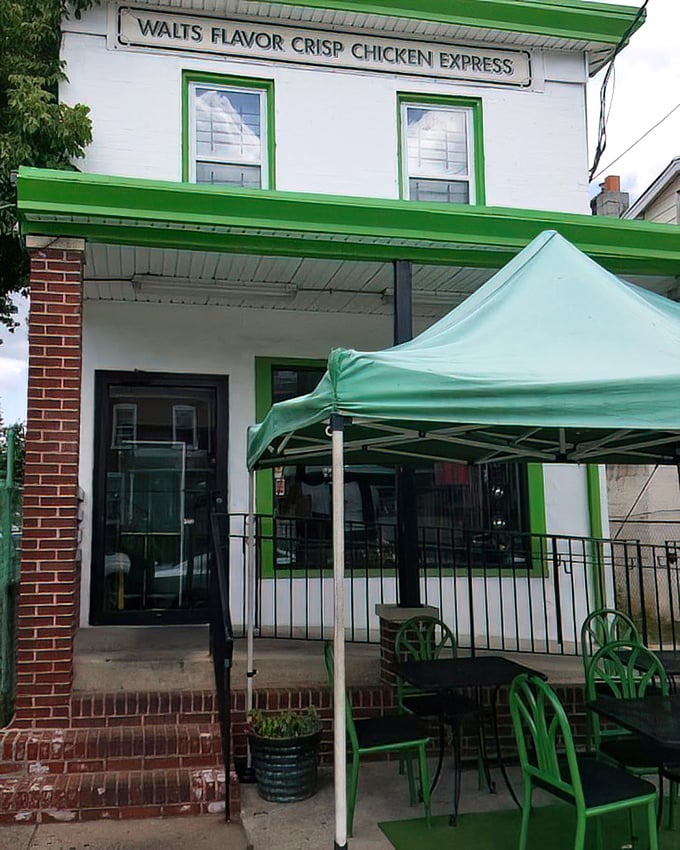 Walt's green-trimmed building stands like a beacon of hope for the crispy-chicken deprived. Salvation is just one bite away!