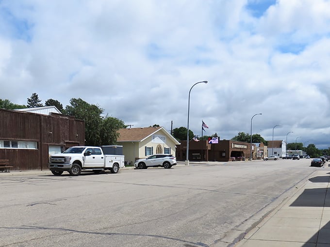 Washburn's main street stretches out with grain elevators standing sentinel, honest symbols of hardworking agricultural heritage.