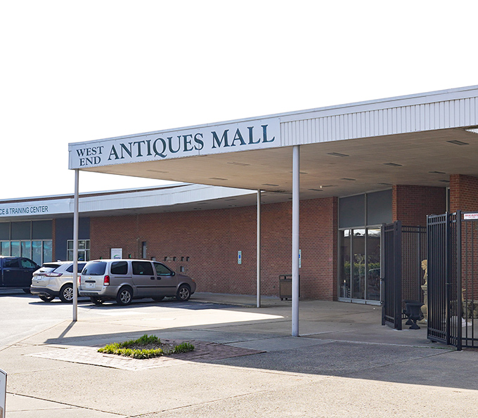 West End Antiques Mall's understated entrance belies the wonderland within. That awning has sheltered generations of treasure hunters.