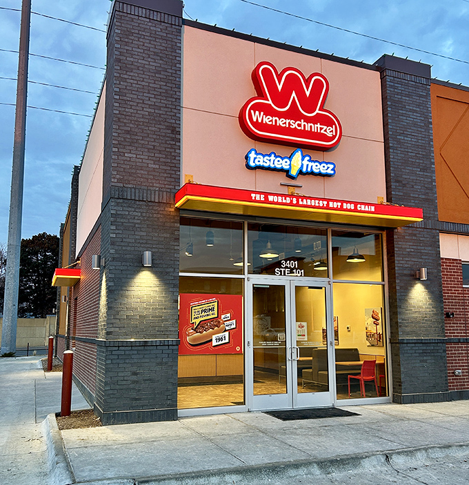 Wienerschnitzel's modern storefront houses hot dog royalty. The world's largest hot dog chain didn't earn that title by accident!