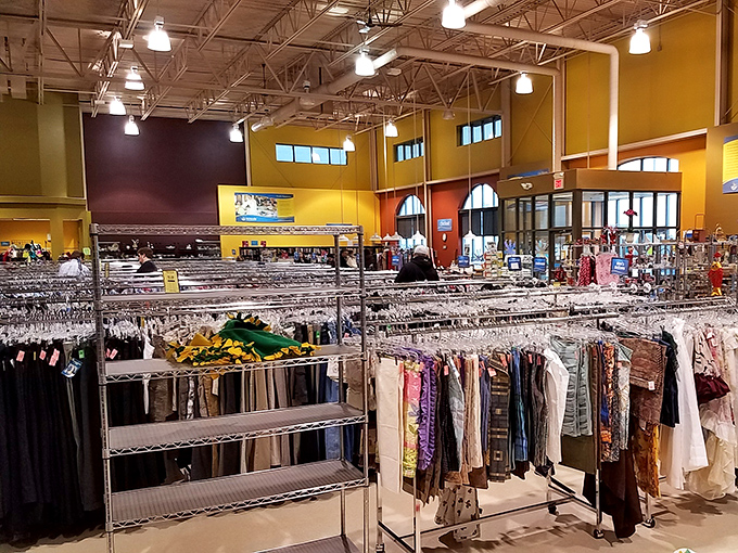 Inside reveals a clothing wonderland where racks stretch toward high ceilings like fashion skyscrapers.