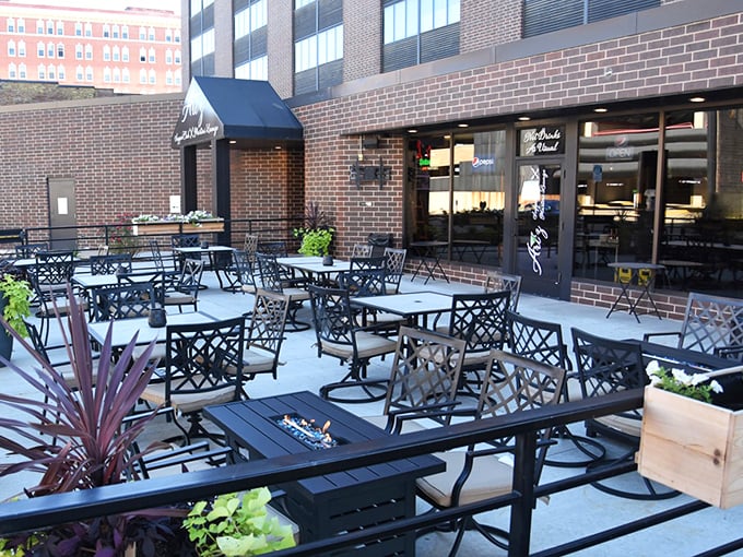 The outdoor patio at Ari'z is where summer evenings and sizzling steaks create memories that last through winter.