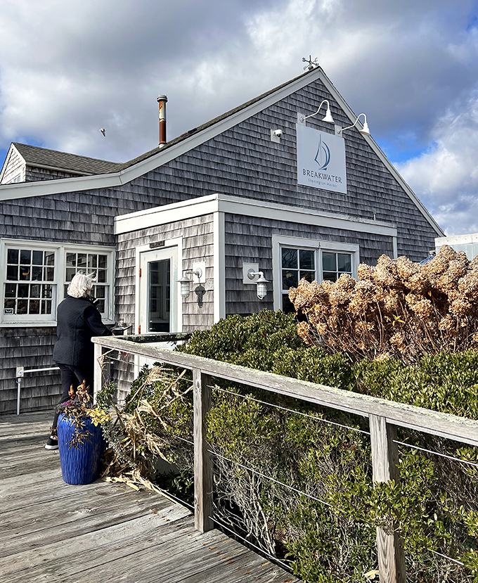 Those weathered shingles have witnessed countless sunsets and satisfied seafood lovers. If walls could talk, they'd say "Order the scallops!"