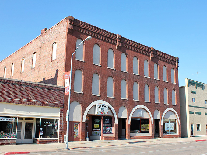 Arches to everywhere! This brick beauty in Beatrice offers THE OFFICE and so much more&mdash;architectural rhythm that dances even when the street stands still.