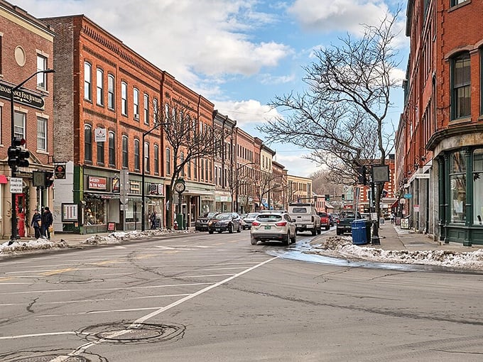 Evening lights illuminate Brattleboro's main drag, where $1,200 monthly buys you a front-row seat to Vermont's most eclectic small-town scene.