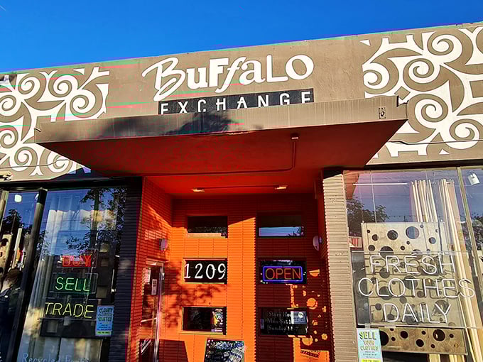 The sunset glow on Buffalo Exchange's facade hints at the golden vintage finds waiting inside. Fashion archaeology at its finest.