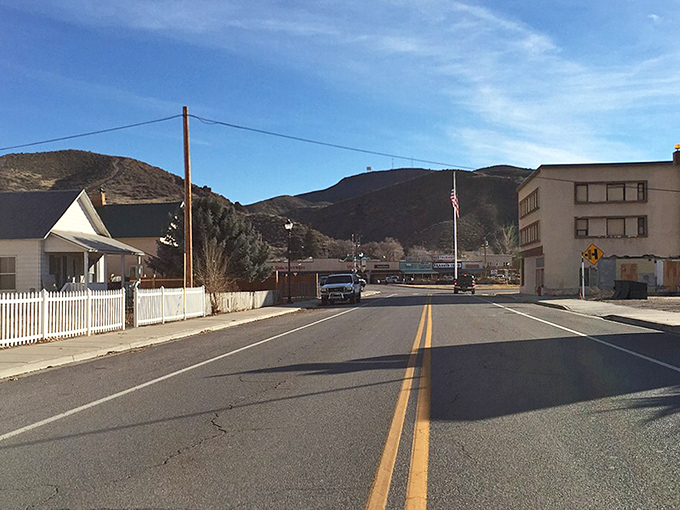 The quiet streets of Caliente offer peaceful views of the surrounding mountains, where desert meets sky in a palette of earthy colors.