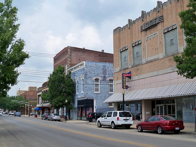 Classic small-town intersection where neighbors meet and community connections happen naturally every day.