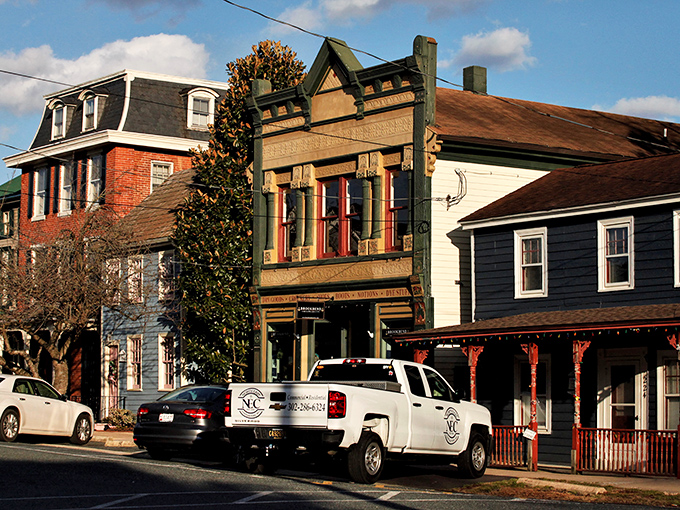 Chesapeake City's colorful Victorian homes line up like well-dressed guests at a waterfront garden party.