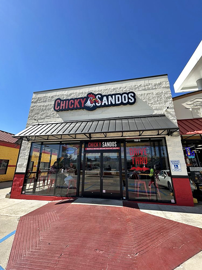 Clean lines, bright windows, and that confident rooster logo hint at chicken sandwiches worth crossing town for.