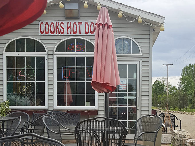 Those arched windows and string lights create the kind of atmosphere that makes every meal feel special.