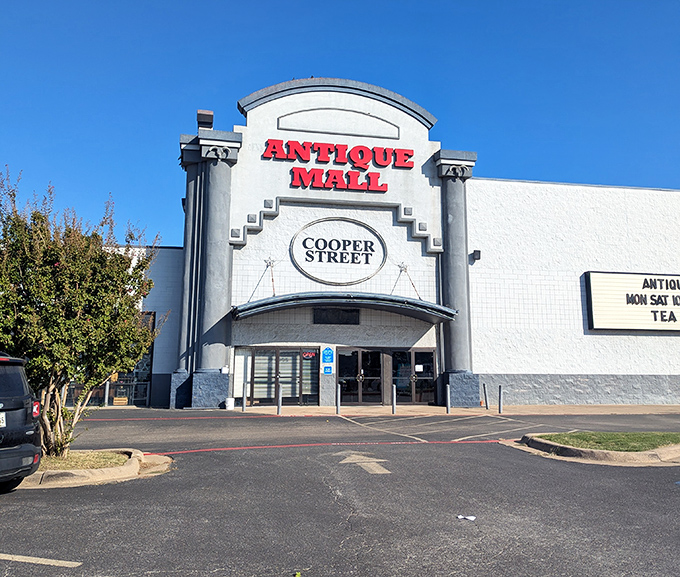 The grand entrance beckons like a portal to yesteryear, promising adventures in every aisle of this antique wonderland.