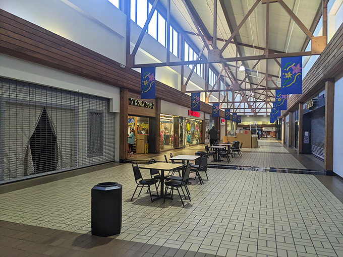 The mall walkway might be quiet, but inside Corn Dog 7, there's a sizzling celebration of cornmeal-wrapped goodness.