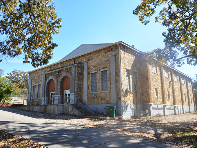 This stone building represents the solid craftsmanship that built Arkansas communities to last through generations.