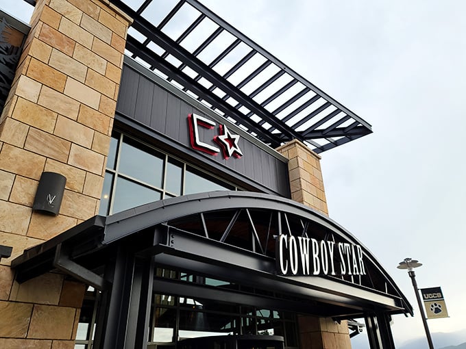 The Cowboy Star sign promises western flair with urban sophistication. Inside, steaks that make you want to write thank-you notes to cows.