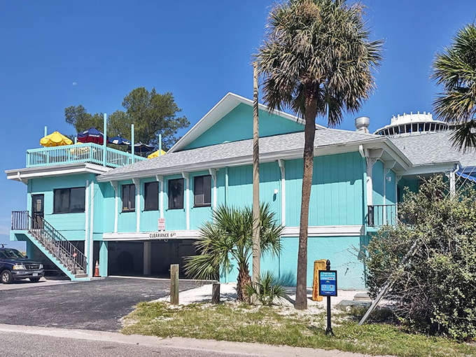 Classic coastal architecture frames the entrance to grouper sandwich heaven on St. Pete Beach.