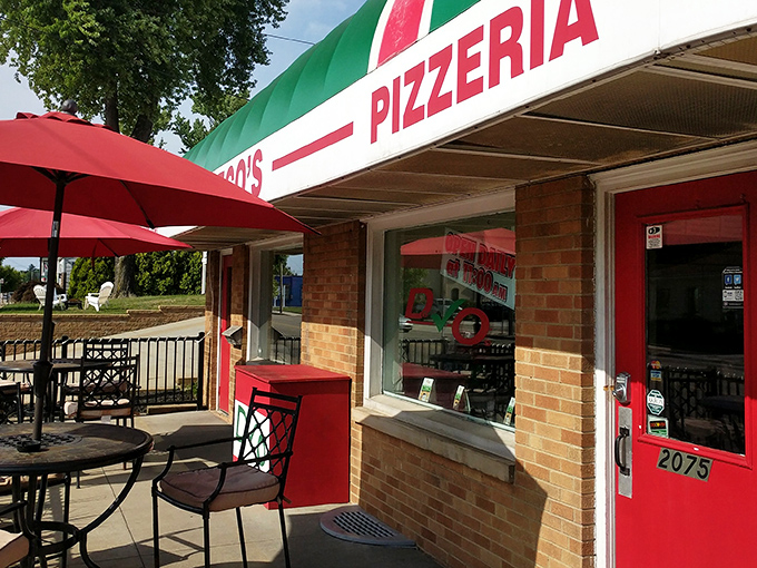 DeCheco's Pizzeria: The bright red door and umbrella tables invite you to slow down and savor pizza the way it's meant to be enjoyed.