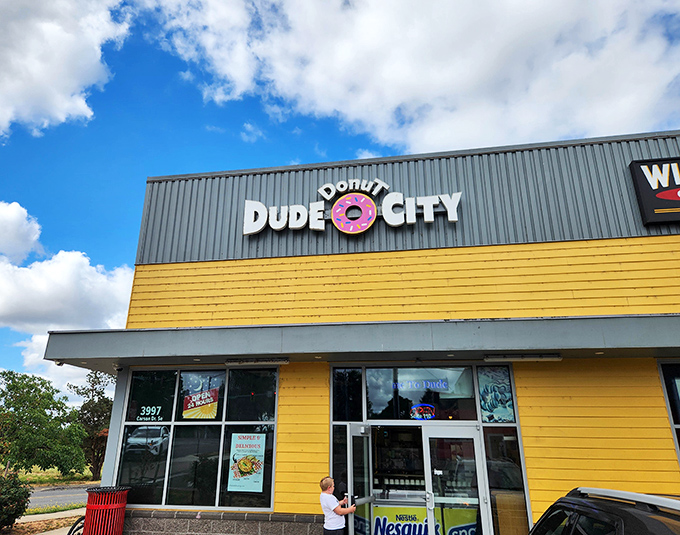 The bold Dude Donut City sign promises adventure in every bite. This Salem hotspot brings playful energy to traditional treats.