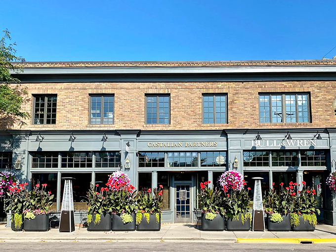 Victorian charm embraces modern comfort where Lake Minnetonka creates the perfect backdrop for weekend getaway dreams.