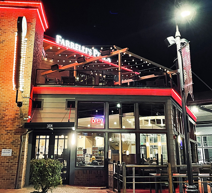 Glass facades reveal the theater of pizza-making, where every fold and stretch becomes edible entertainment magic.
