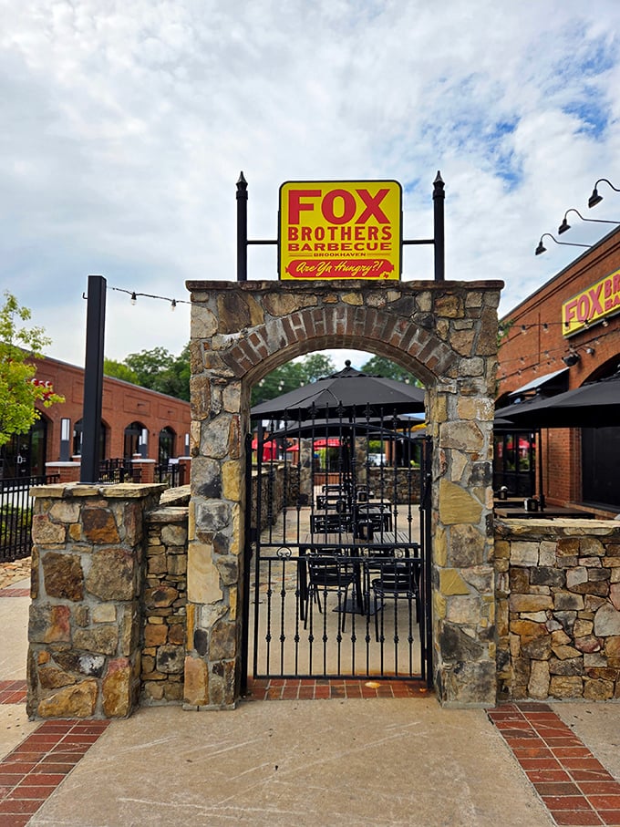 Behind that wrought iron gate lies a courtyard of carnivorous delights. The barbecue equivalent of finding Narnia!