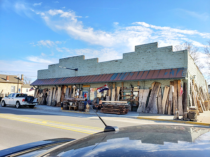 A fountain surrounded by roses proves that small towns know how to celebrate simple beauty.
