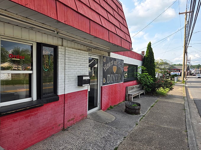 Rain or shine, that red and white exterior promises gravy-covered happiness waiting just inside.
