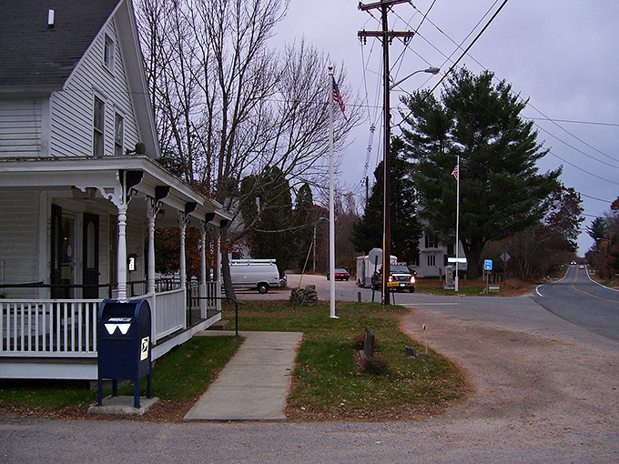 Small-town Americana stands sentinel in Hopkinton, where the blue mailbox serves as both communication hub and unofficial town landmark.