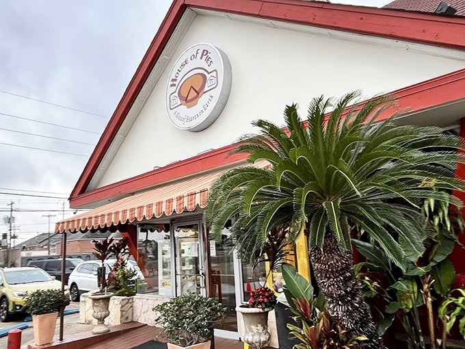 Those palm trees and red trim signal serious pie business and comfort food done right.