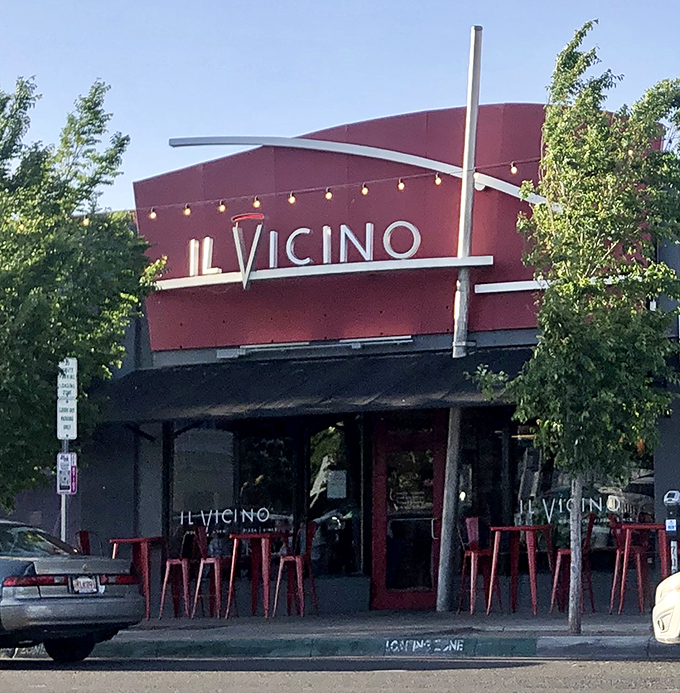 Modern design meets old-world techniques at Il Vicino. That striking red building houses a wood-fired oven that's the star of the show.