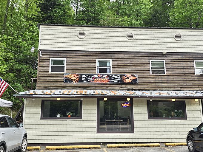 The modest storefront of Kaz's hides world-class BBQ like a superhero's secret identity. That "OPEN" sign is your bat signal.
