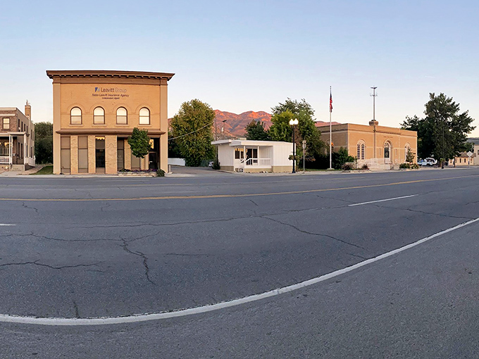 Mountains rise behind Nephi like protective guardians, creating views that make every morning coffee taste a little bit better.