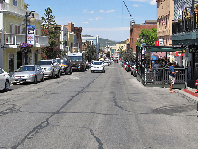 Historic buildings march up the mountain in Park City, where mining town charm meets modern mountain resort sophistication perfectly.