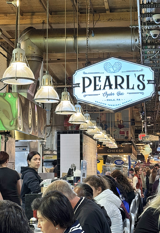 Pearl's Oyster Bar: The hanging sign guides hungry market-goers to seafood nirvana. Watch skilled hands transform ocean treasures into edible art.