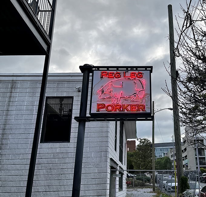 Peg Leg Porker's glowing pink sign is the Vegas of barbecue billboards – impossible to miss and promising a good time.